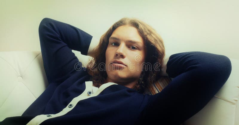 Chilling Out. Portrait of a Handsome Young Man Relaxing on a Sofa ...