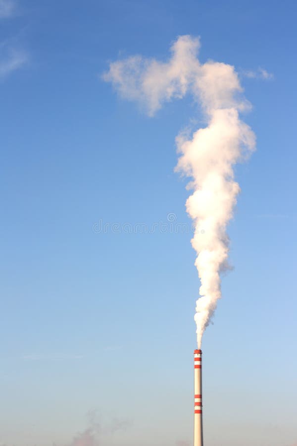 Chimney against blue sky stock photo. Image of tower - 12677760