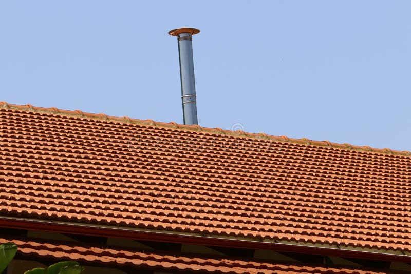 Chimney against blue sky stock photo. Image of blue - 218180926
