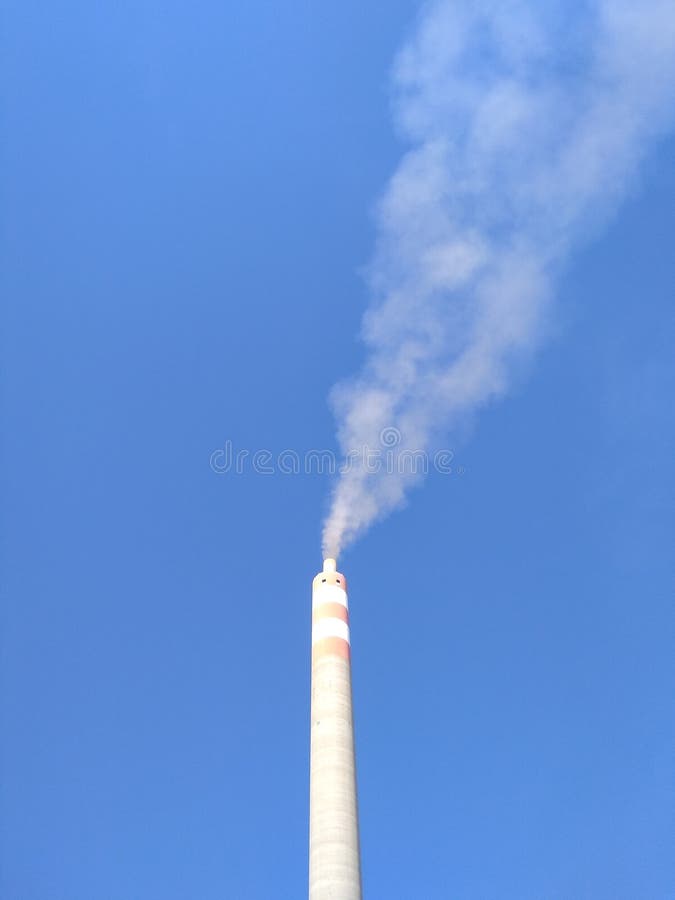 Chimney emitting smoke stock image. Image of emitting - 370782001