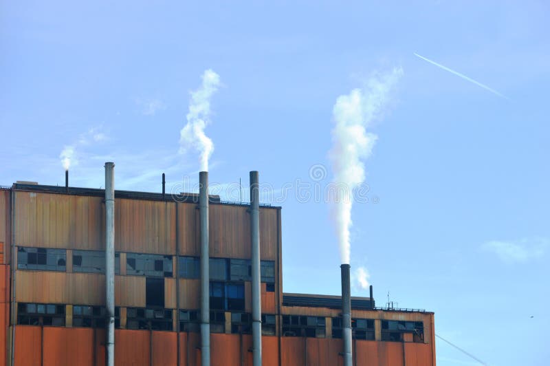 Chimneys and factory smoke stock image. Image of arena - 273151491