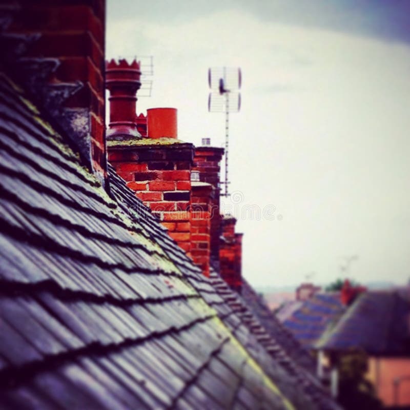 Chimneys and rooftops stock photo. Image of distance - 54586252