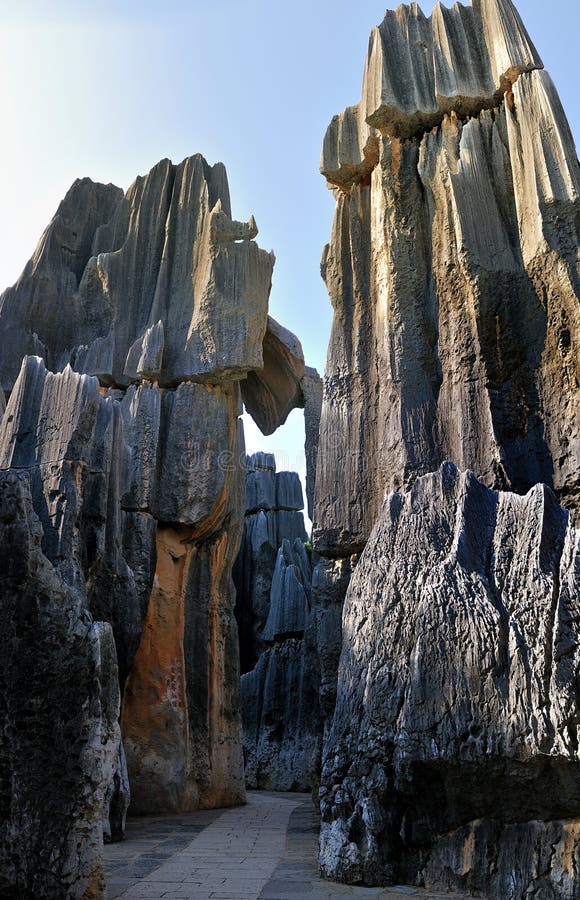 Stone forest stock image. Image of kunming, clouds, evolution - 18458361