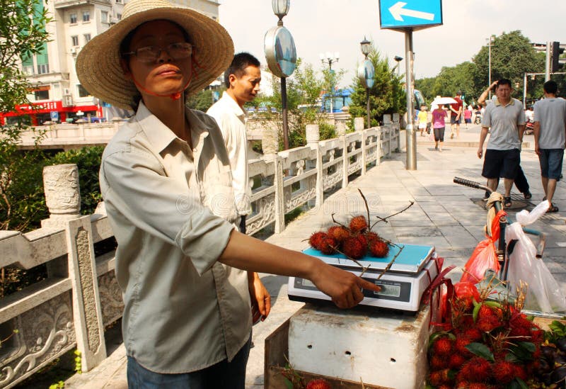 Fruit Seller Walks with a Carrying Pole in the Old Quarter. the 36 Old ...