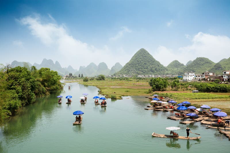 Bamboo Rafting in Yangshuo Li River Stock Photo - Image of boat, pier ...