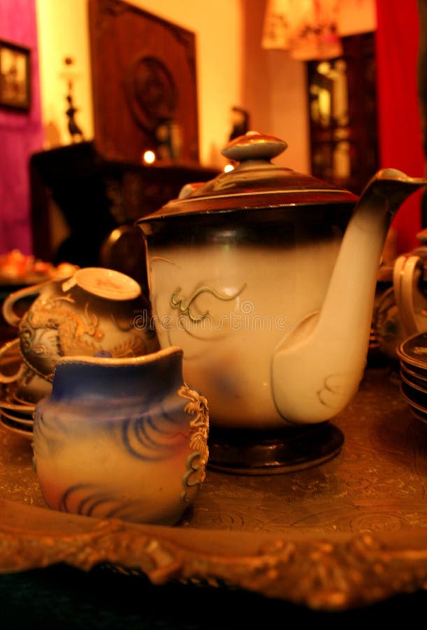 Chinaware teapot on a tray stock photo. Image of drink - 367721340