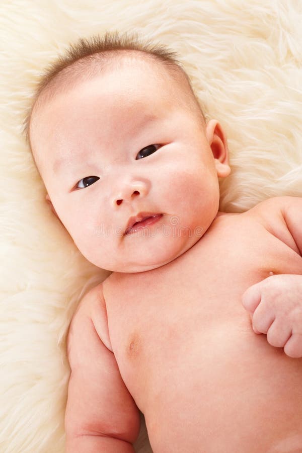 Chinese baby face smirking stock photo. Image of looking - 19376676