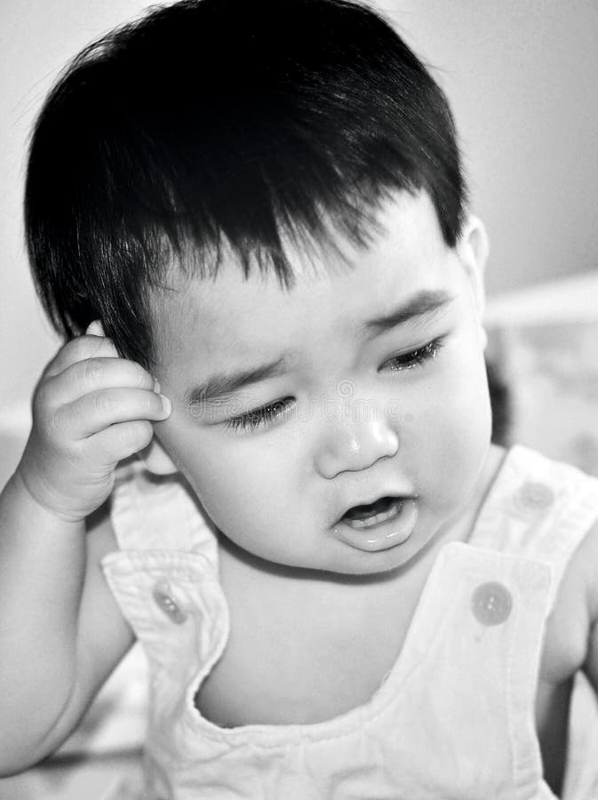 A chinese baby is crying stock image. Image of unhappy - 25118841