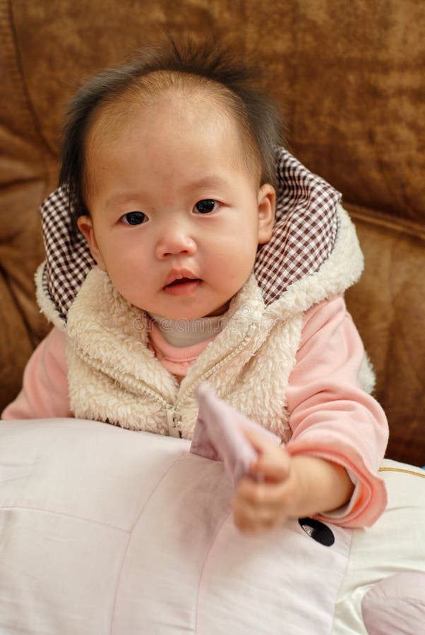 Chinese baby girl stock image. Image of carefree, arms - 7265667