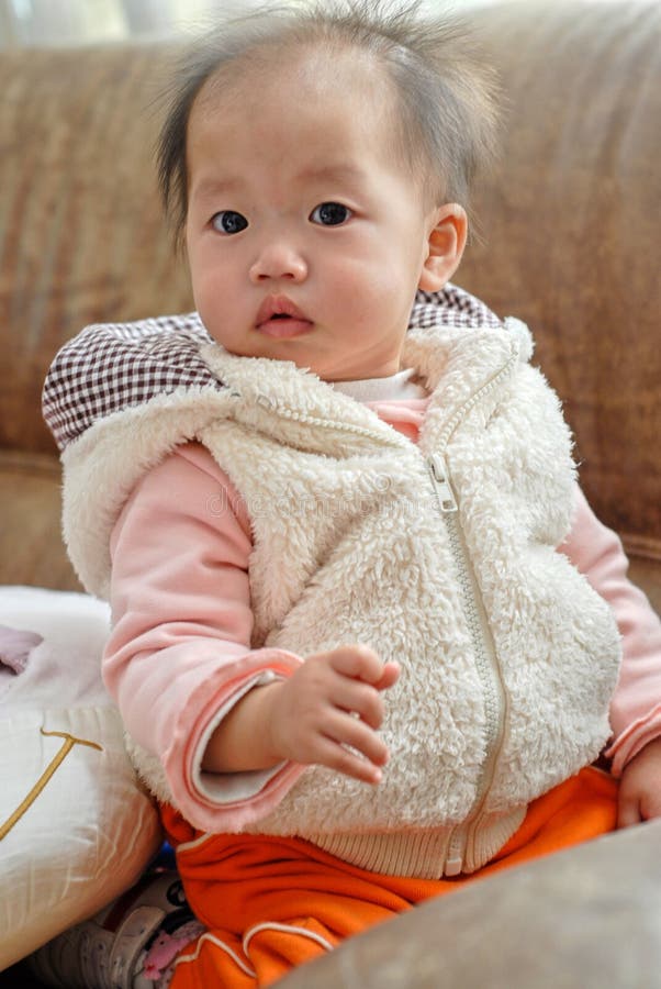 Chinese baby girl stock image. Image of comfortable, adorable - 7265493