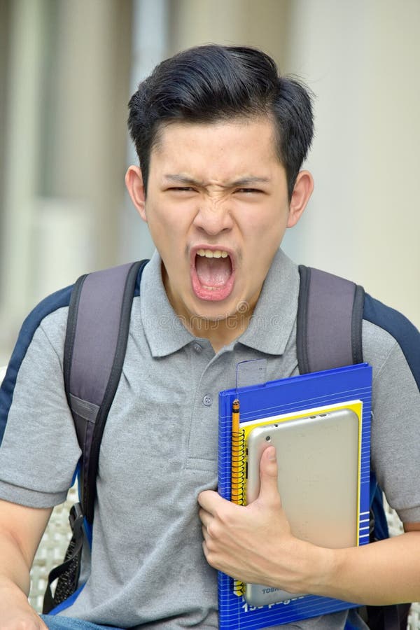 Chinese Boy Student Under Stress with Books Stock Photo - Image of ...