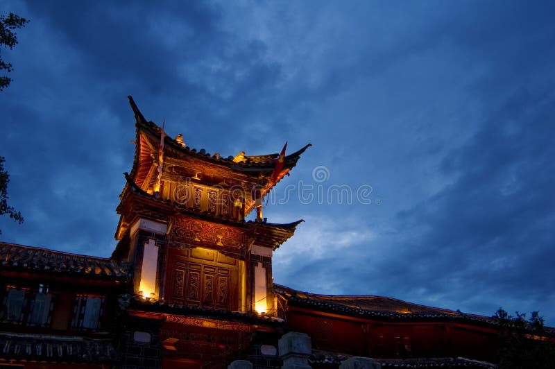 Chinese building in yunnan stock image. Image of night - 5913073