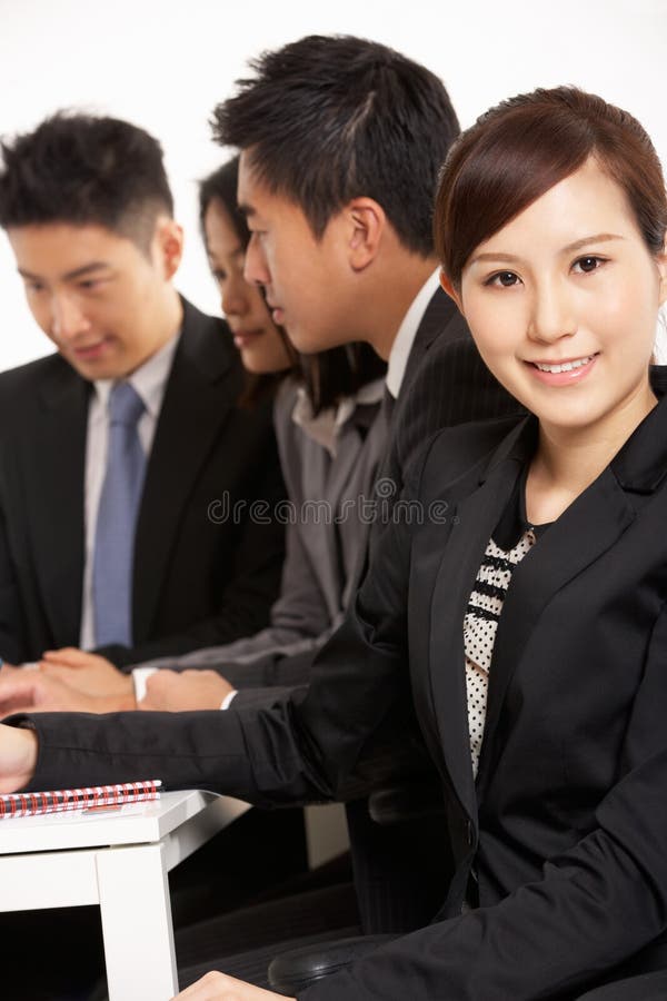 Chinese Businesspeople Having Meeting Stock Photo - Image of discussing ...