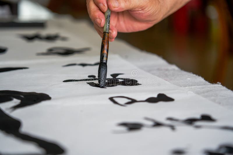 A Chinese Calligrapher Writes Calligraphy and Creates a Calligraphy ...