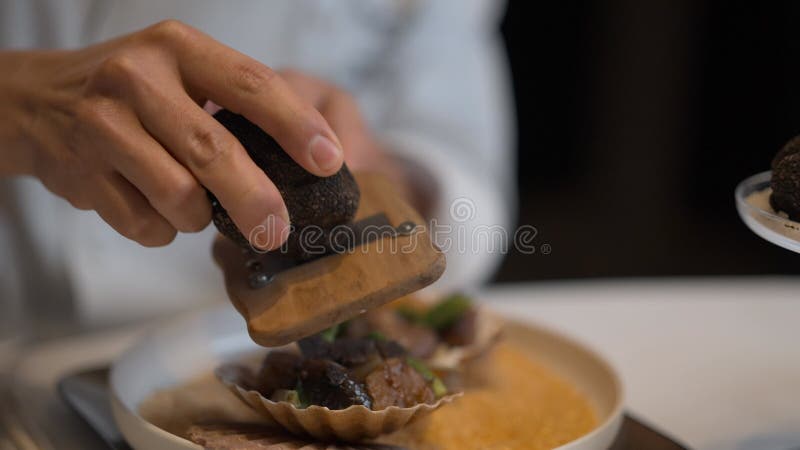 Chef cutting truffle stock video. Video of asia, expensive - 356605279