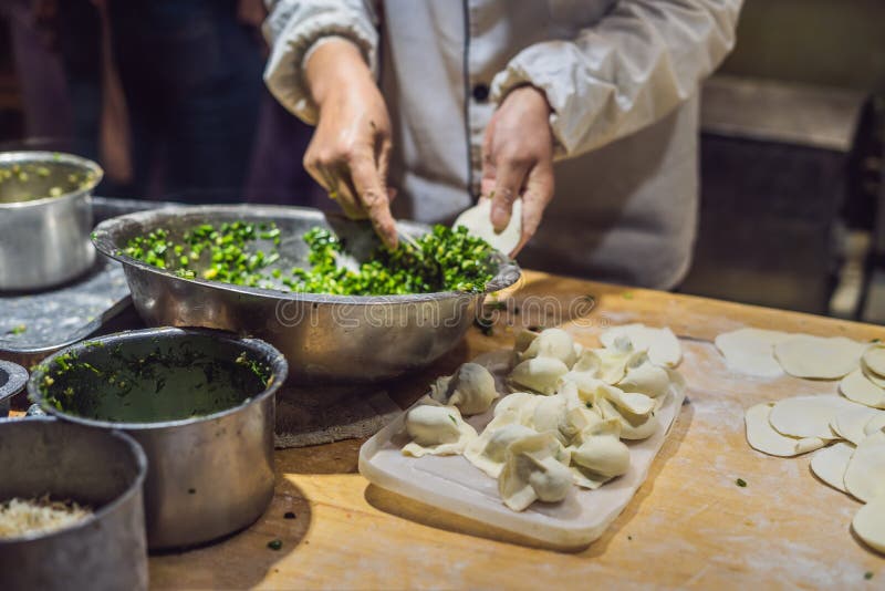 Chinese Chef Making Dumplings in the Kitchen Stock Photo - Image of ...