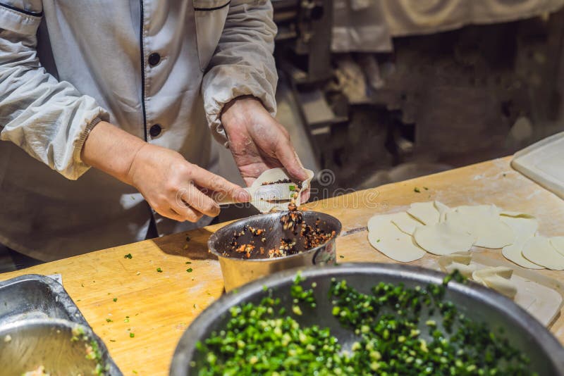 Chinese Chef Making Dumplings in the Kitchen Stock Photo - Image of ...