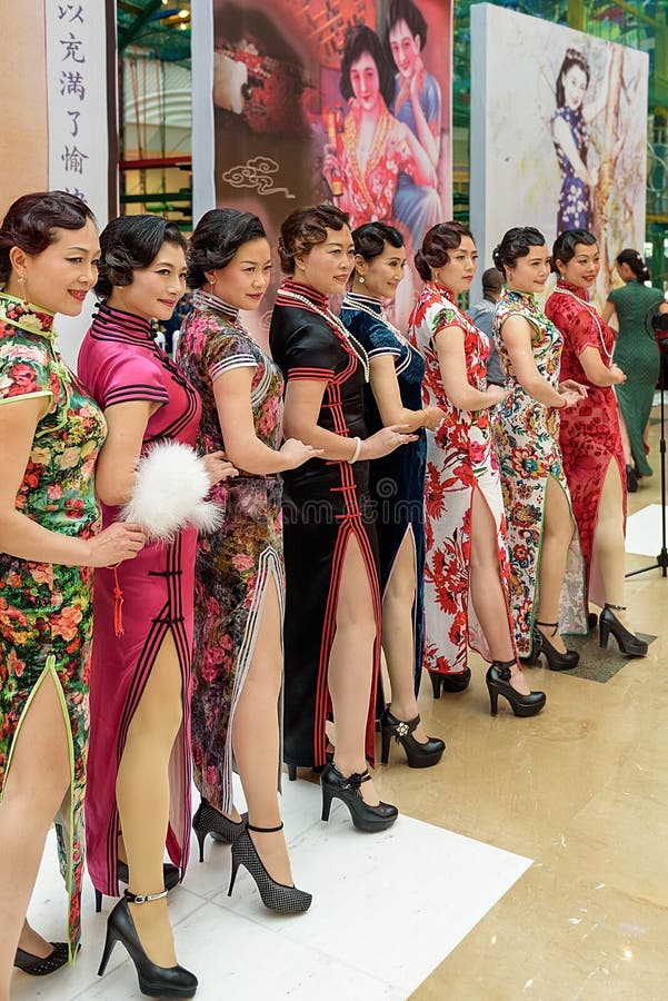 A Chinese Woman Wears Cheongsam in the Water Park of Shanghai Stock ...