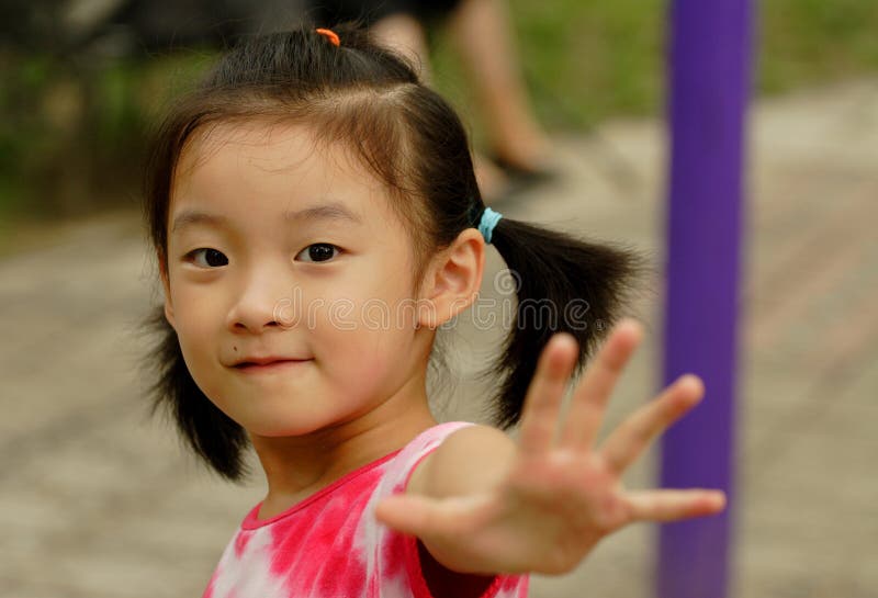 Chinese child hand stop stock photo. Image of youth, hairs - 1101164