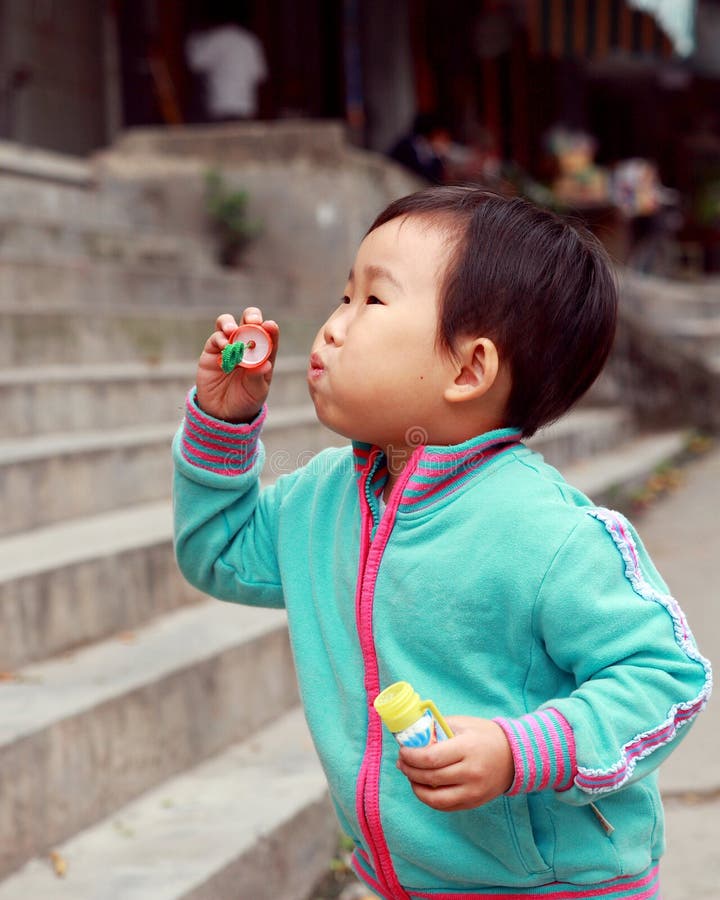 Chinese children playing. stock photo. Image of female - 6635244