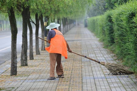 A Chinese Cleaner is Sweeping Street Editorial Photography - Image of ...