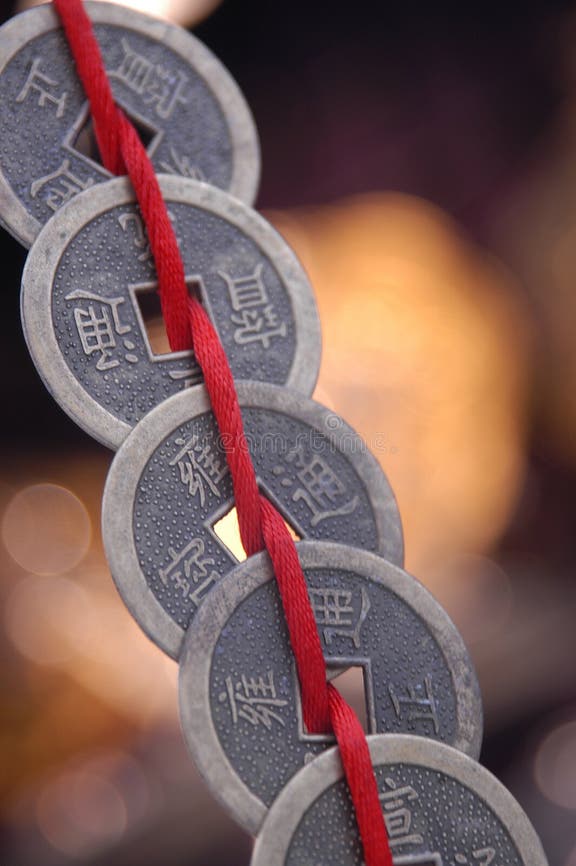 Chinese Coins on string stock photo. Image of lucky, characters - 12572