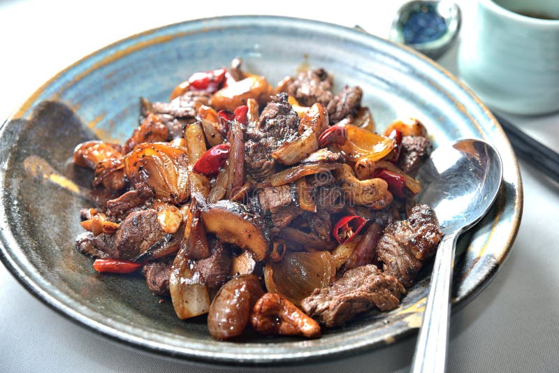 Chinese Cuisine Stir Fried Chilly Beef Stock Photo - Image of onion ...
