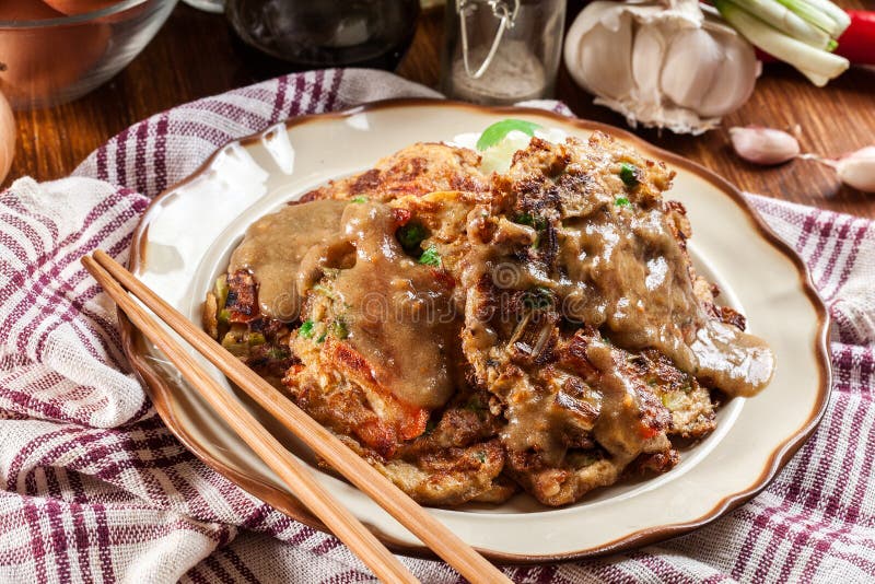 Chinese Egg Fu Yung Omelette Stock Photo - Image of prepared, food ...