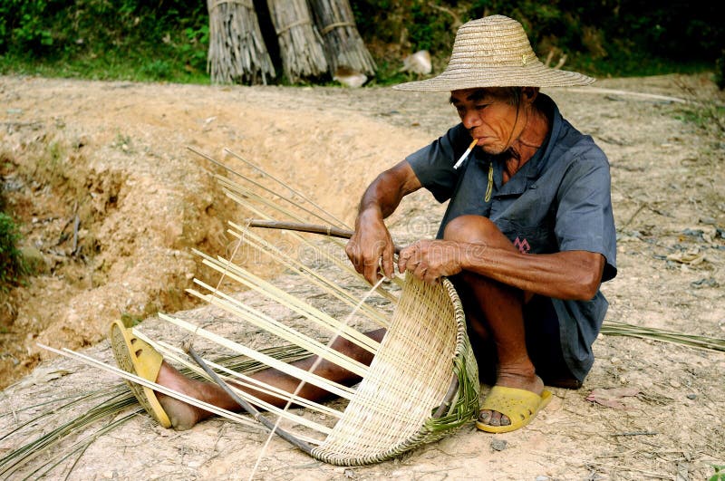 Chinese elderly in weaving editorial image. Image of travel - 36386625