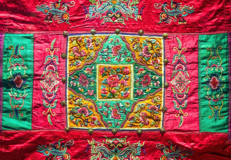 Chinese Ethnic Patterns Embroidered on Red Cloth Stock Image - Image of ...