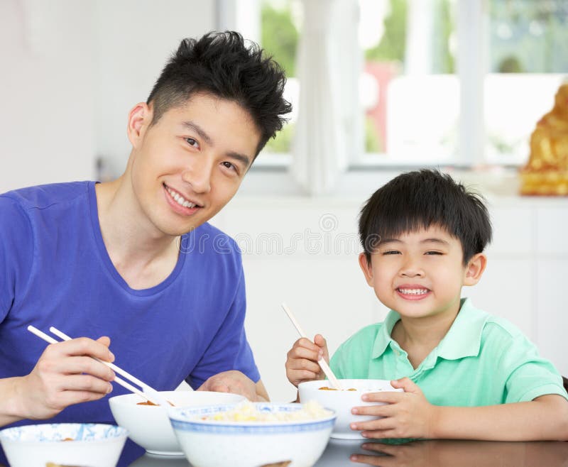 Chinese Father and Son Sitting Using Laptop Stock Image - Image of ...