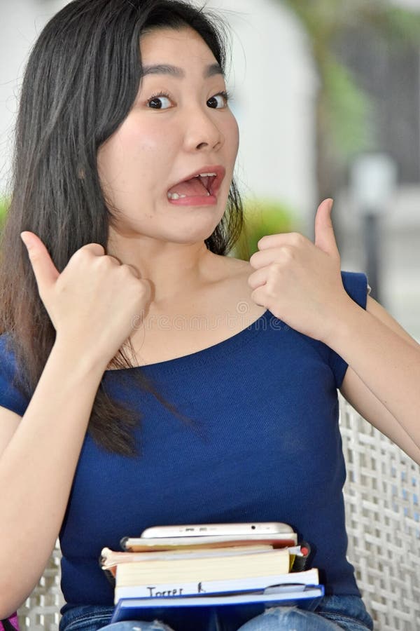 Chinese Female Student Making Funny Faces Stock Image - Image of ...