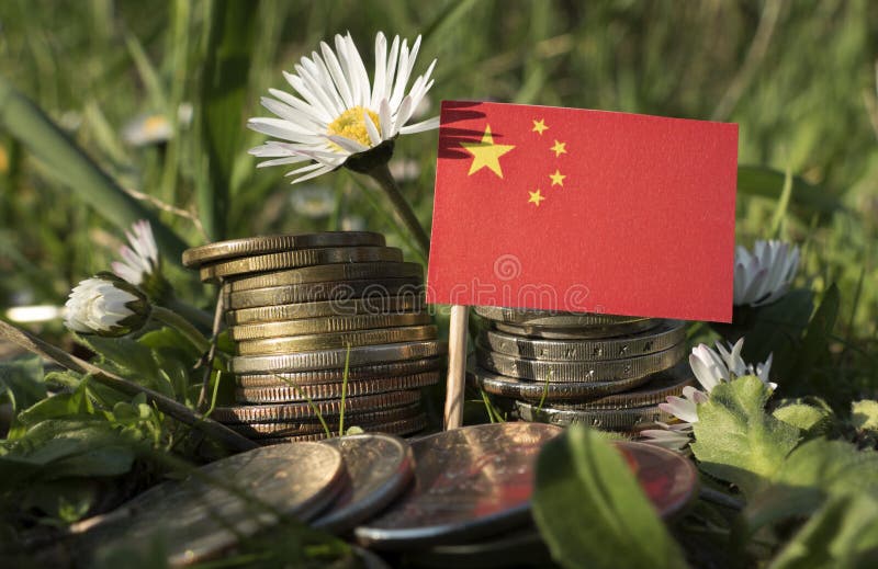 Chinese Flag with Stack of Money Coins with Grass Stock Image - Image ...