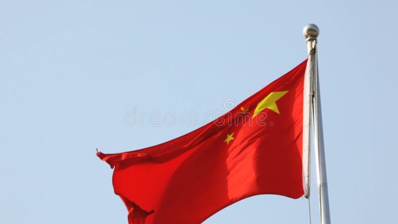 The Chinese Flag Waves Prominently Amidst Shanghai S High Rise ...