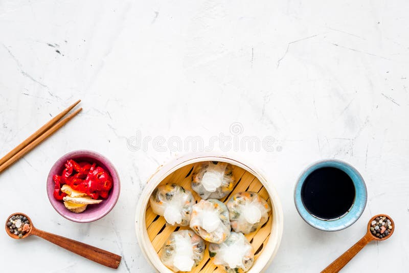 Chinese Food Set With Dim Sum, Sticks On Black Background Top View ... Chinese Food Set With Dim Sum, Sticks On Black Background Top View ...