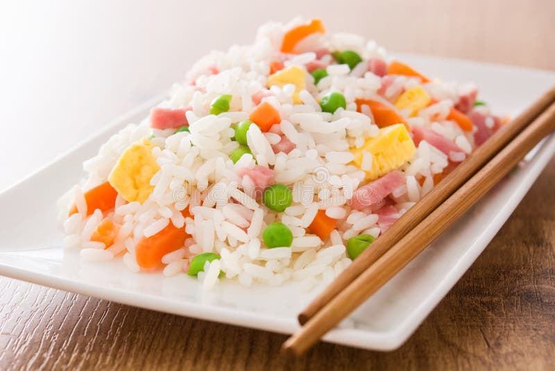 Chinese Fried Rice with Vegetables and Omelette on Wood Stock Image ...