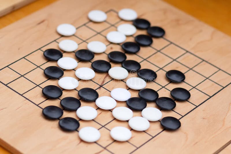 Chinese Go Game Board, Close Up View of Playing Black and White Stone ...
