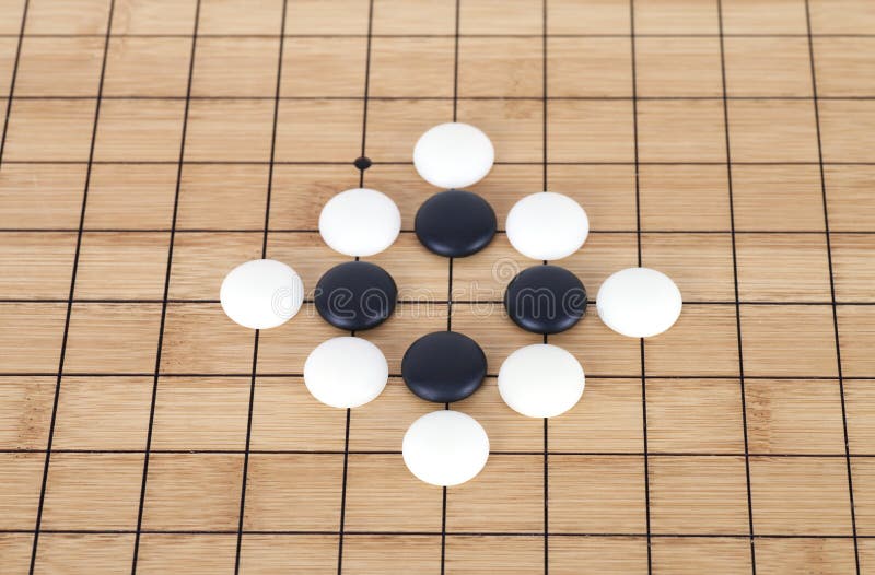 Chinese Go Game on table stock image. Image of steps - 228924335