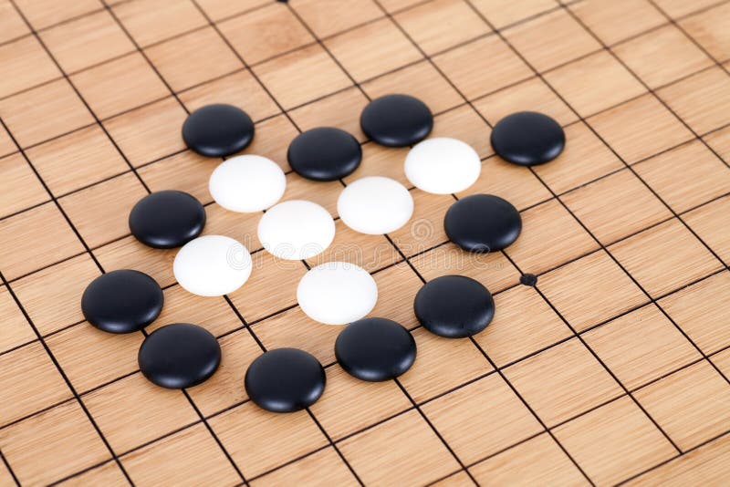 Chinese Go Game on table stock photo. Image of white - 231812902