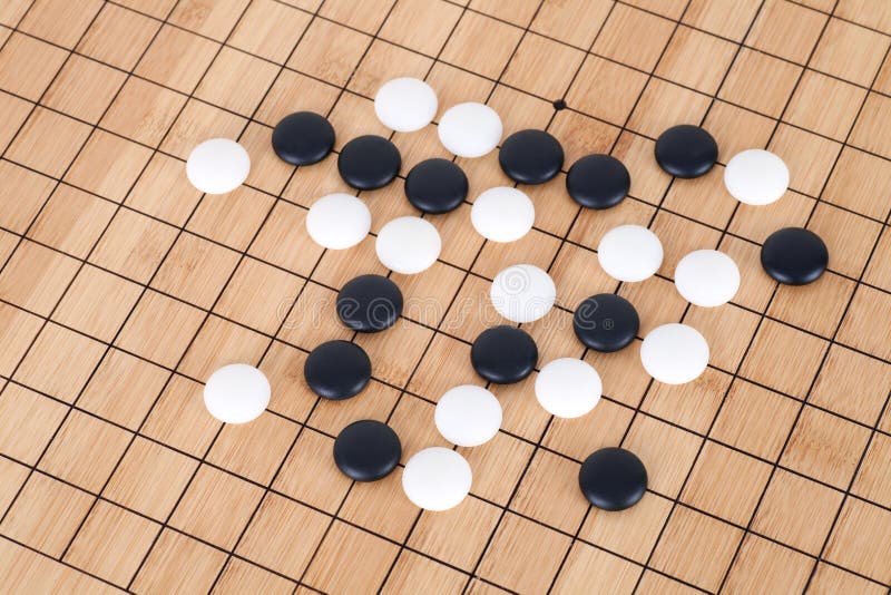 Chinese Go Pieces on the Chessboard Stock Image - Image of steps ...
