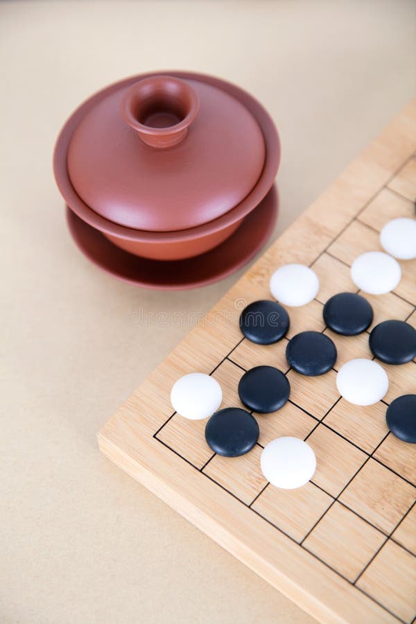 Chinese Go and tea set tea stock photo. Image of looking - 229808312