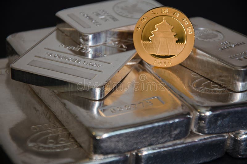 Chinese Gold Panda Coin on Silver Bars Stock Photo - Image of coin ...