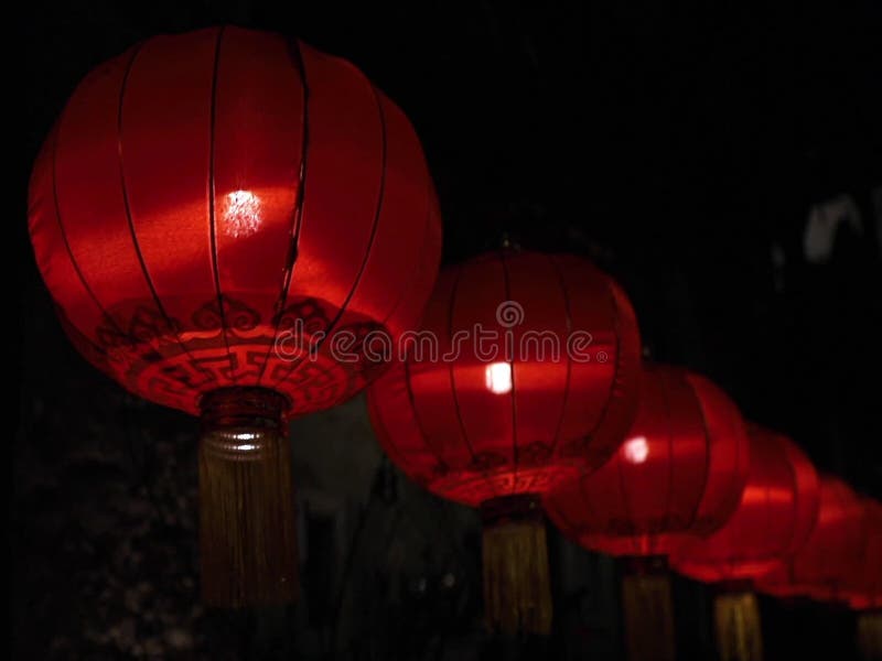 Chinese Lantern & Light Bulb on Dark Background. Stock Footage - Video ...