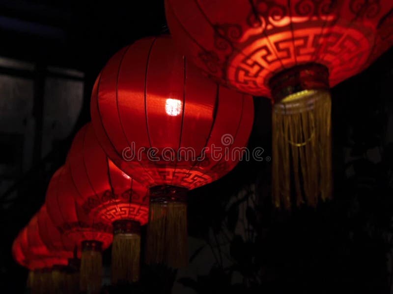Chinese Lantern & Light Bulb on Dark Background. Stock Footage - Video ...
