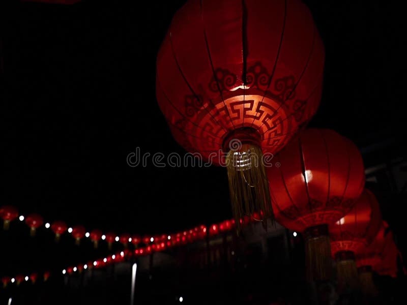 Chinese Lantern & Light Bulb on Dark Background. Stock Footage - Video ...