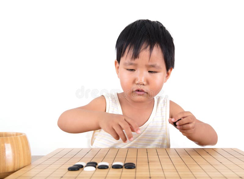 Chinese Little Girl is Learning To Play Go Stock Image - Image of child ...