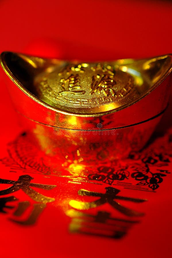 Chinese Lucky Gold Ingot on Calligraphy Backgr Stock Image - Image of ...