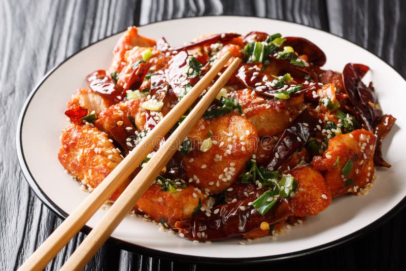 Chinese Mala Chicken with Lots of Sichuan Pepper Closeup in a Plate ...