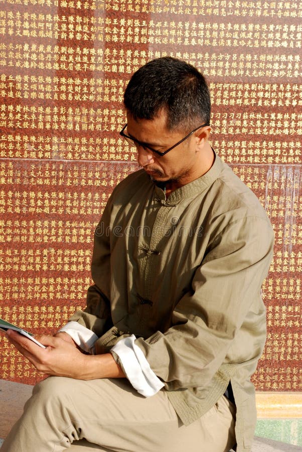 Chinese man read the book stock image. Image of peaceful - 36809093