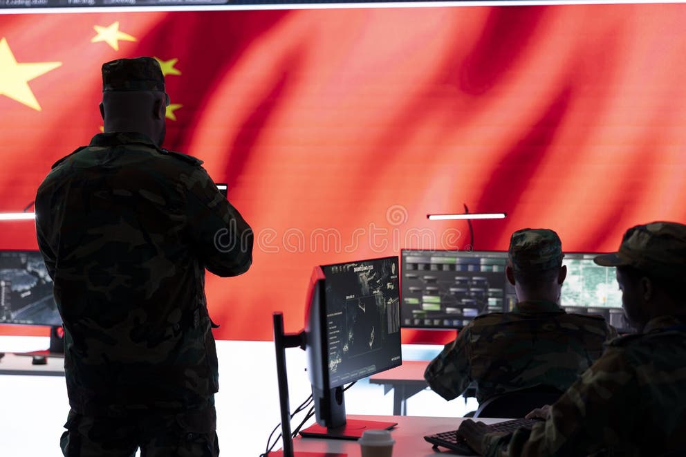 Chinese Military Command Officer Analyzing Data on Computers in a N ...